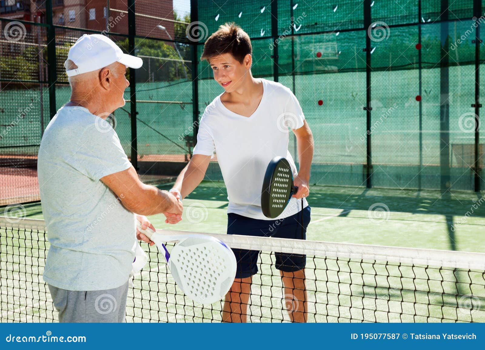 Padel Players of Different Generations Shake Hands before Padel Match ...
