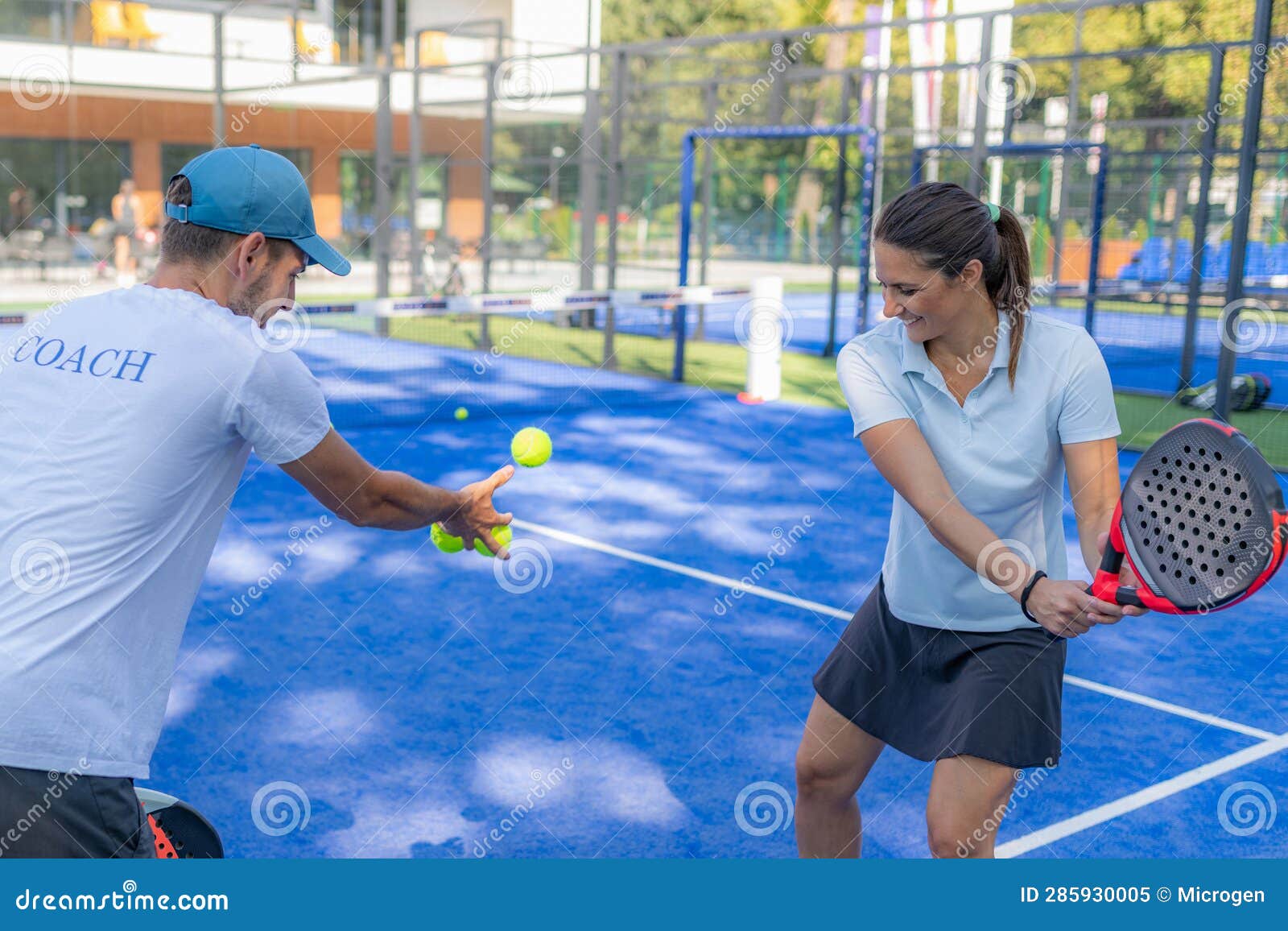 Padel Training. Coach and Female Player, Improving Techniques in a ...
