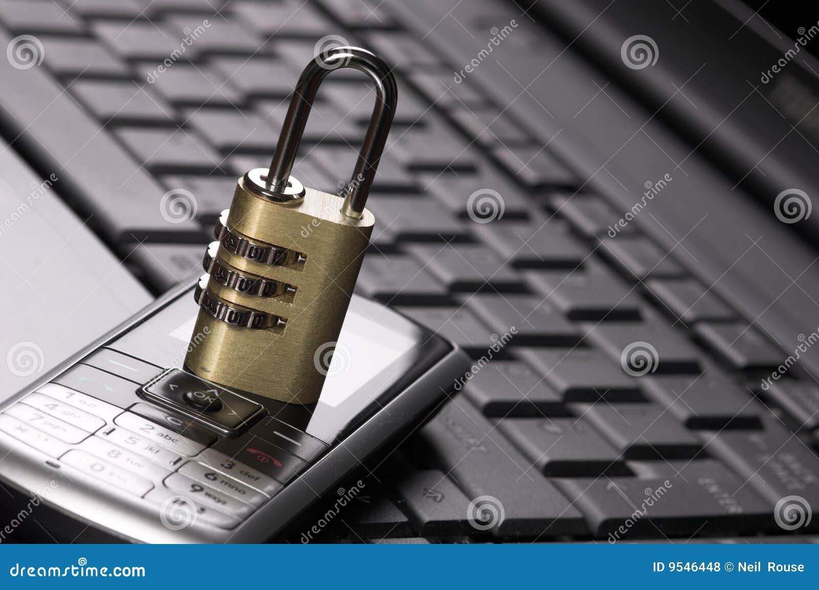 Padlock Ad Mobile Phone on Laptop Stock Photo - Image of phone ...