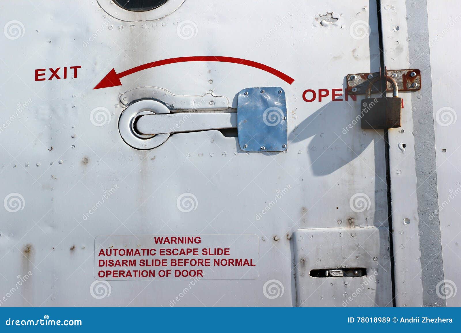 Padlock on aircraft door stock image. Image of safety - 78018989