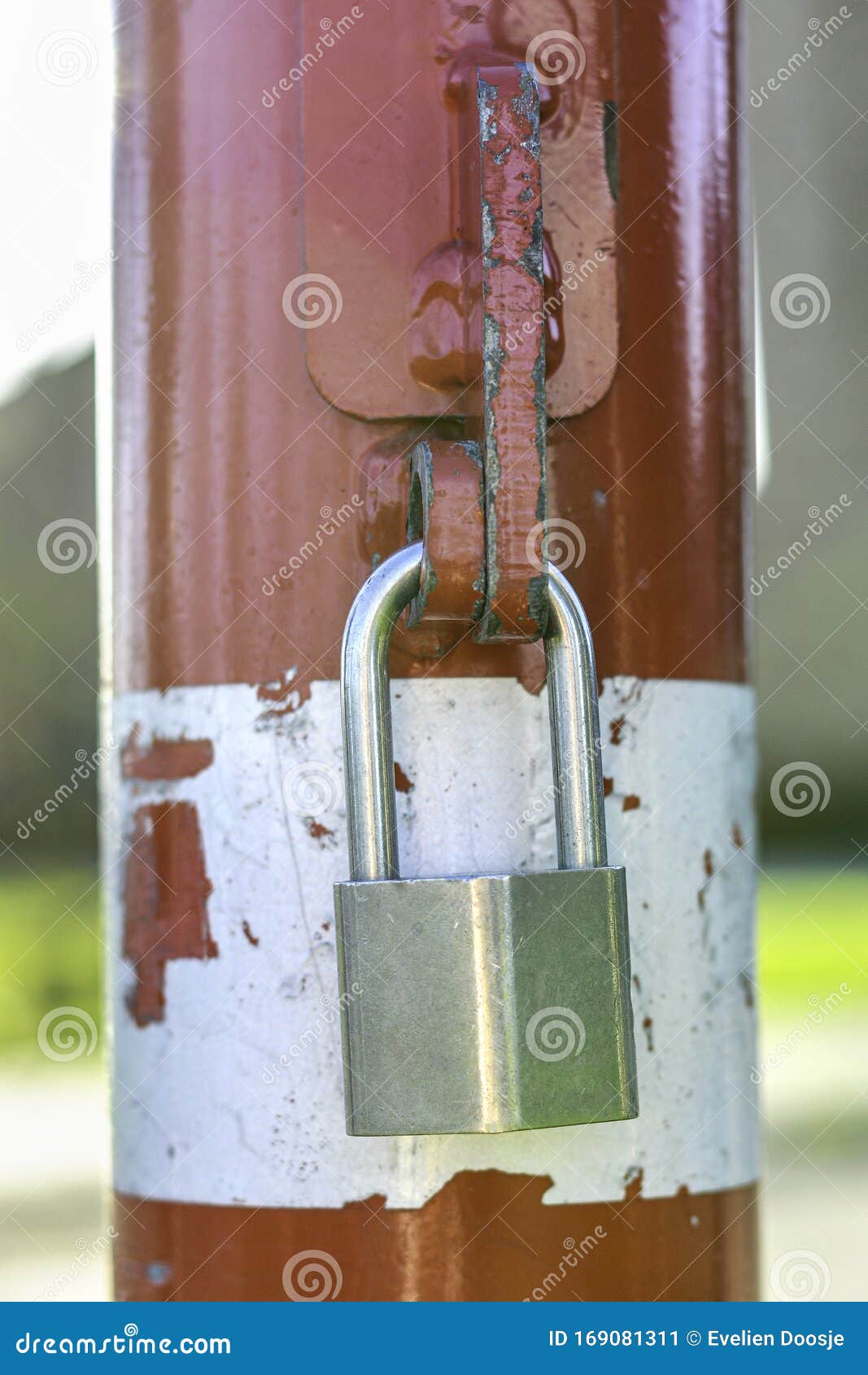 A Padlock Attached To a Red-white Pole Stock Image - Image of control ...