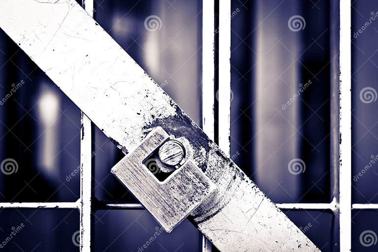 Padlock on the Cell Door of a Prison in Black & White Stock Image ...