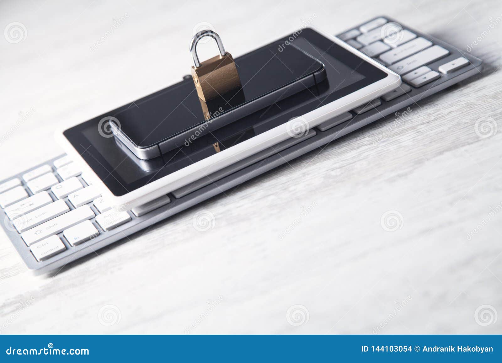 Padlock with Computer Keyboard, Smartphone and Tablet. Internet and ...