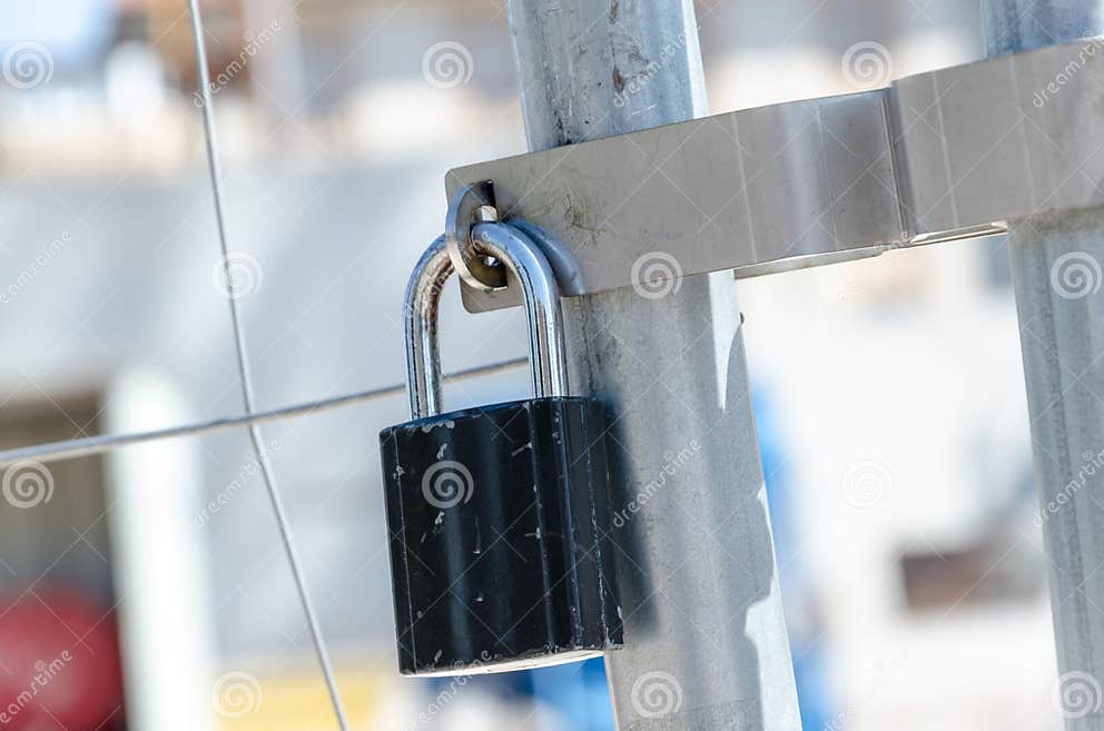 Padlock on a gate stock photo. Image of shut, concrete - 53725476