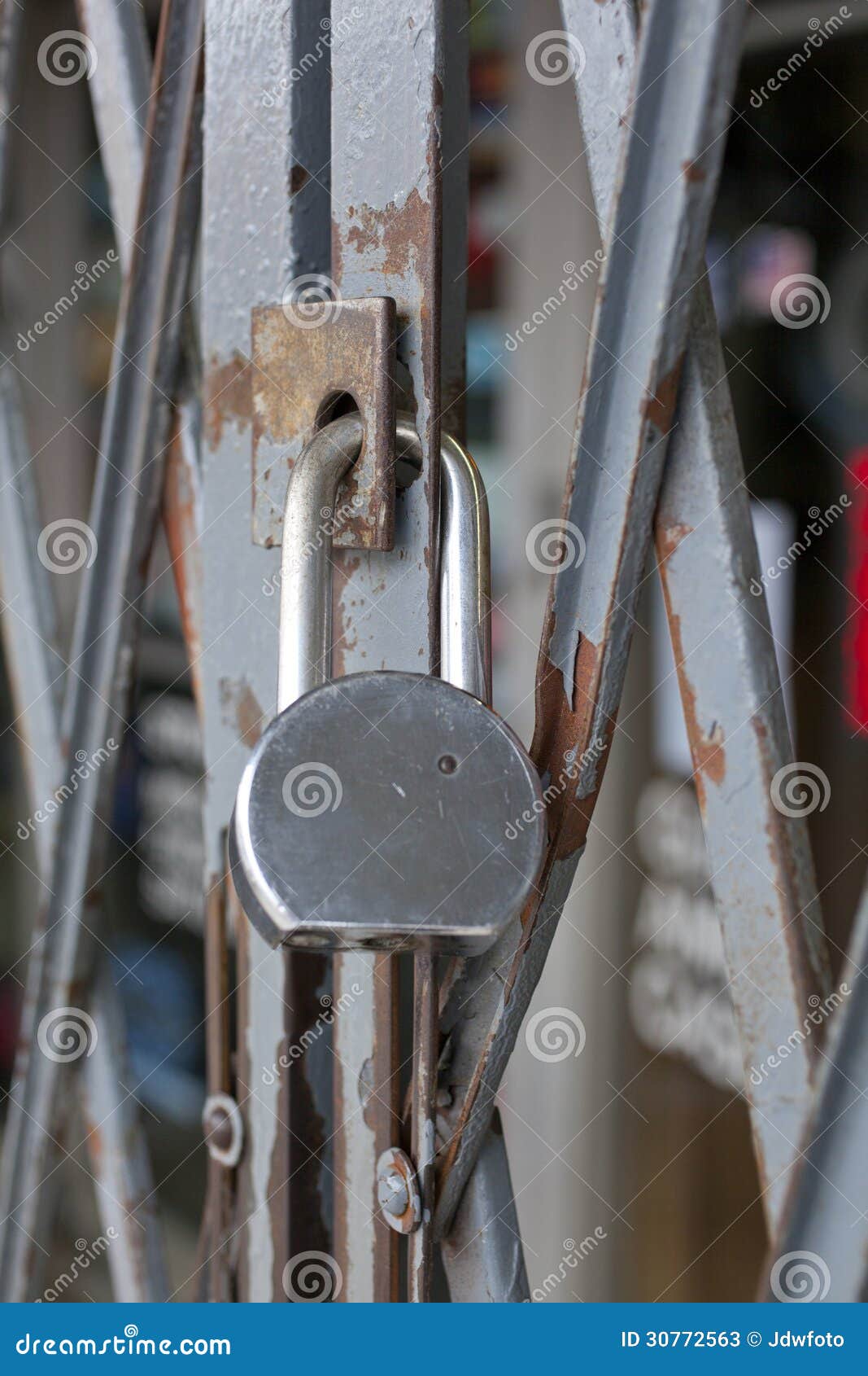 Padlock on a Gated Store Front Stock Image - Image of gate, guard: 30772563