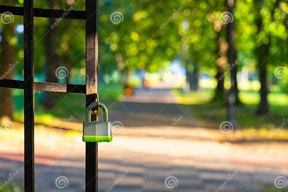 Padlock Hanging on the Gate in the Park Stock Photo - Image of park ...