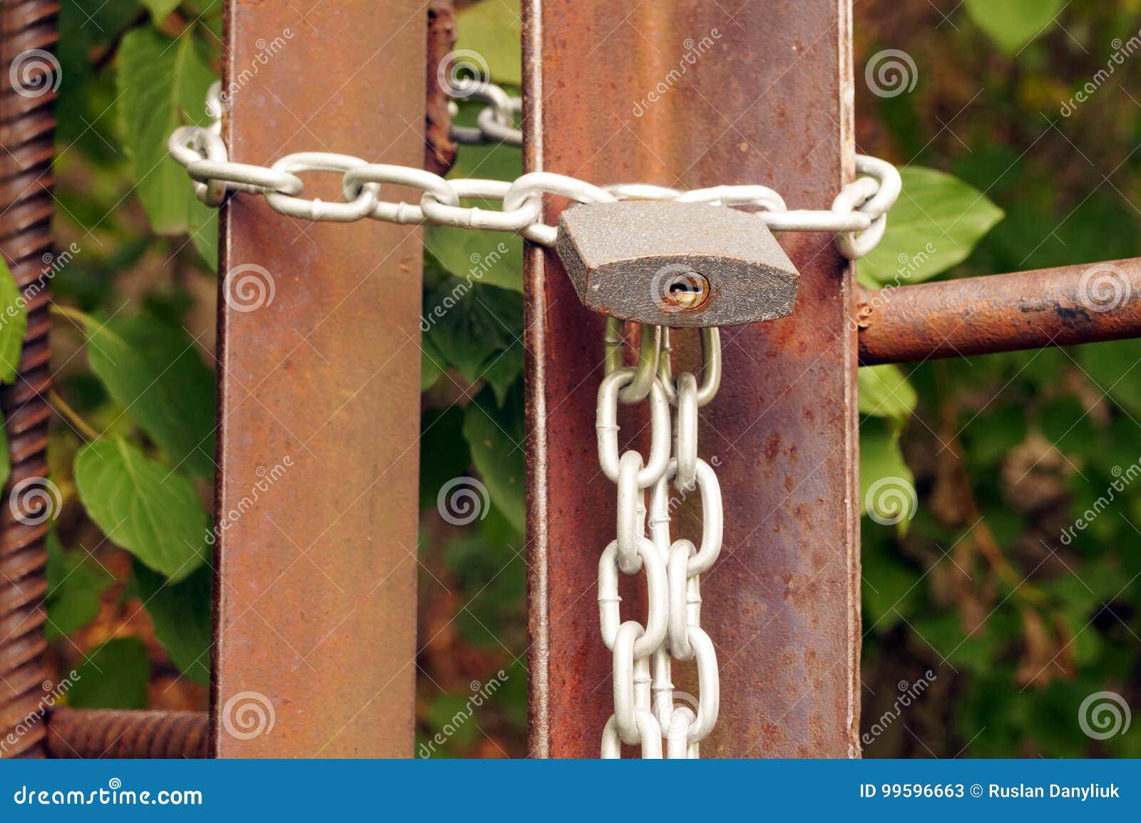 Padlock on the Metal Chain, Locking the Entrance. Stock Image - Image ...