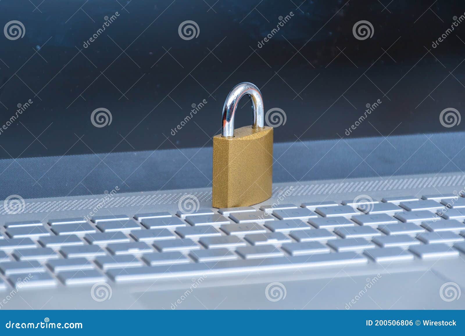 Padlock Placed on a Laptop Keyboard, Safeguarding Your Computer Concept ...