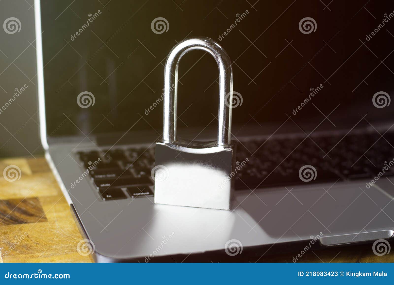 A Padlock is Placed on a Notebook Computer Like a Password To Provide ...
