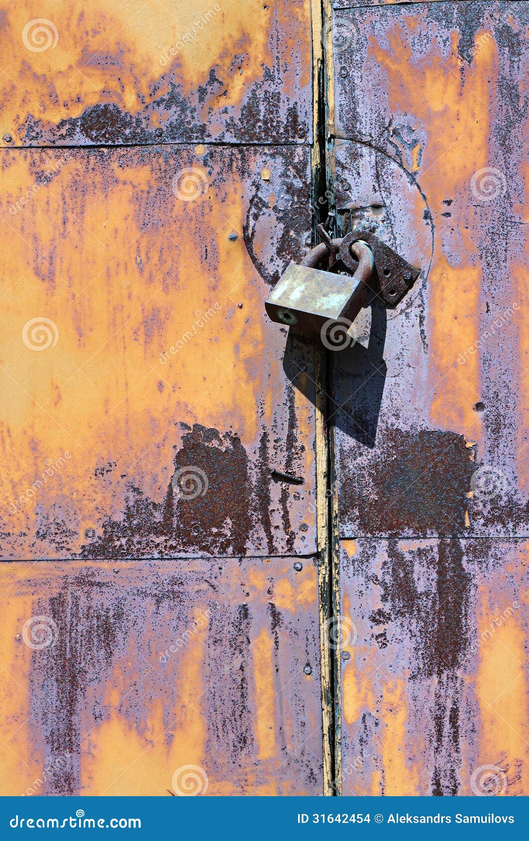 Padlock on rusty iron door stock photo. Image of grungy - 31642454