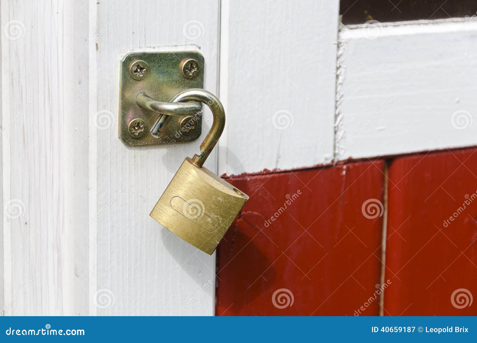 Padlock at a wooden door stock image. Image of painted - 40659187