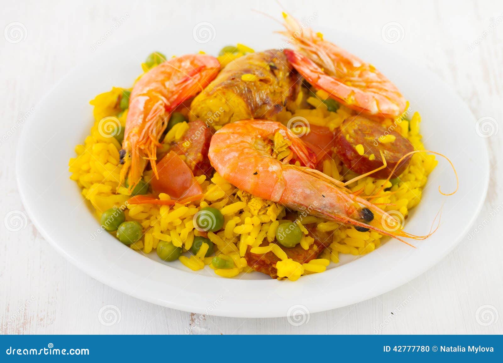 Paella on white plate stock photo. Image of shrimps, white - 42777780