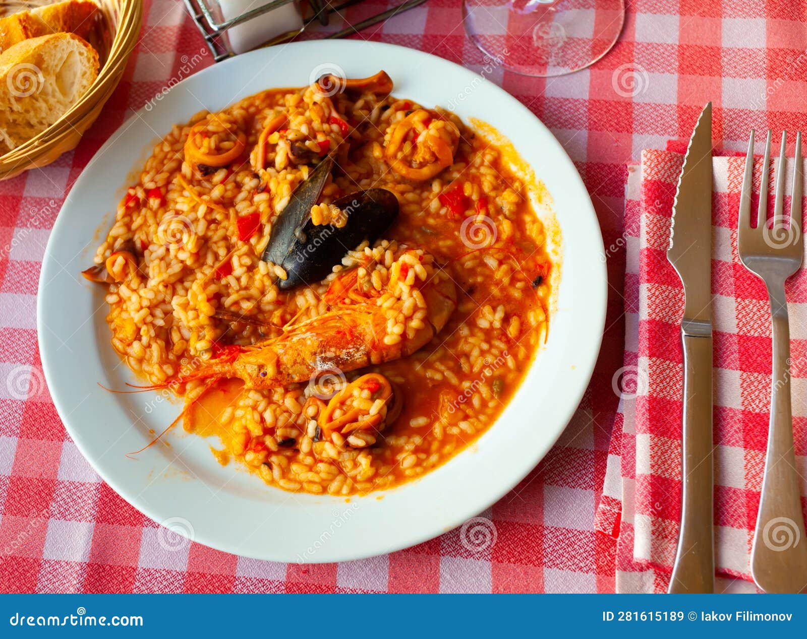 Paella on white plate stock image. Image of rice, cuisine - 281615189