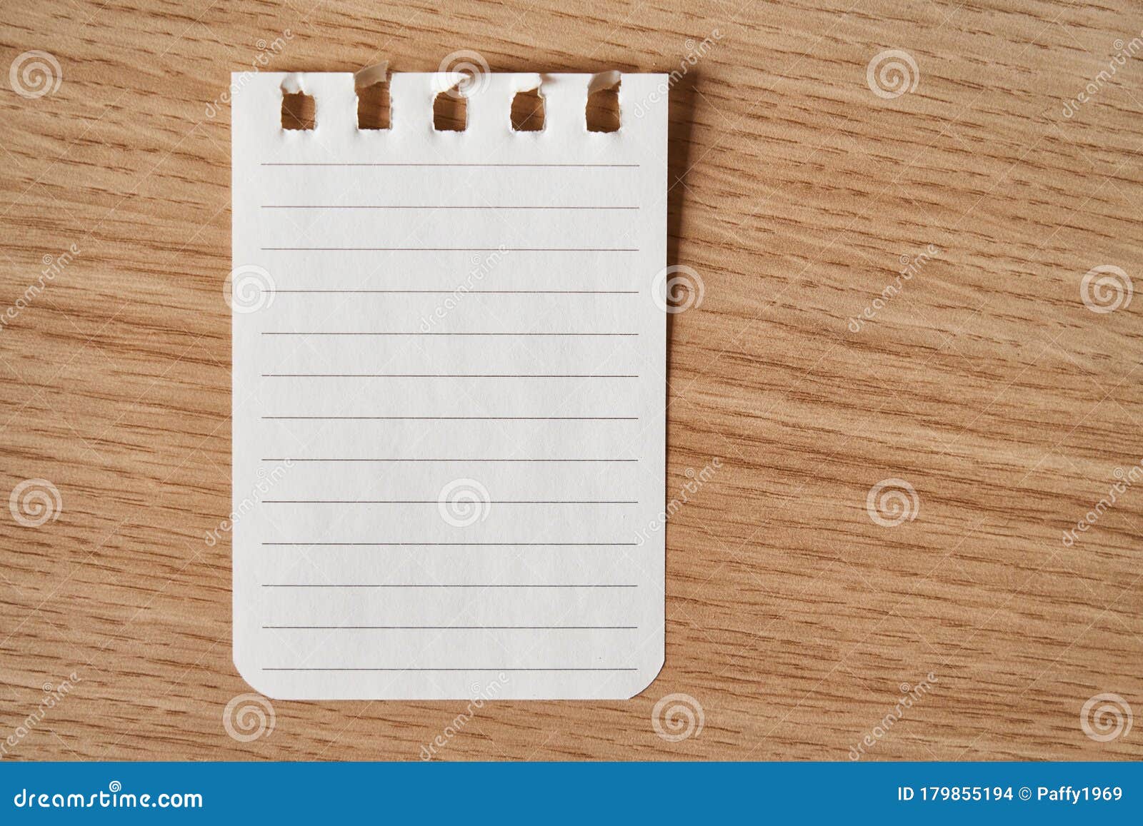 Page of Lined Paper Teared Out of Spring Notebook Lying on Wooden Table ...