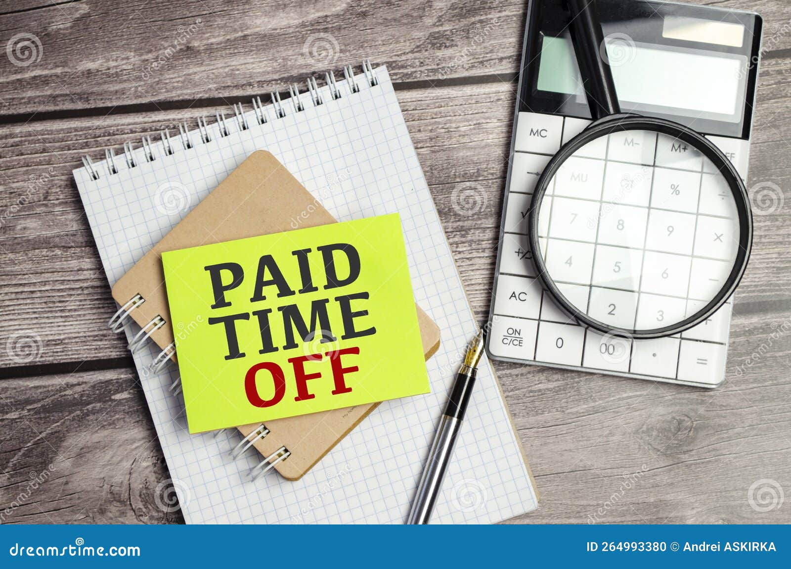 Paid Time Off Wording on a Green Sticker and Notepad Stock Photo ...