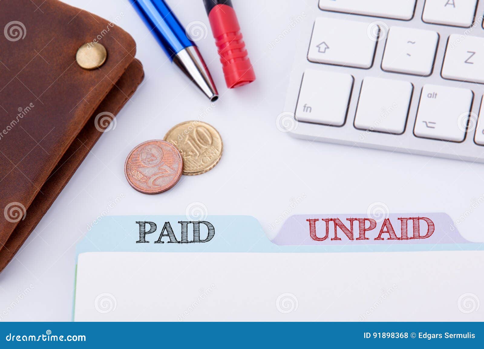 Paid and Unpaid. Folder Register on a White Office Table Stock Photo ...