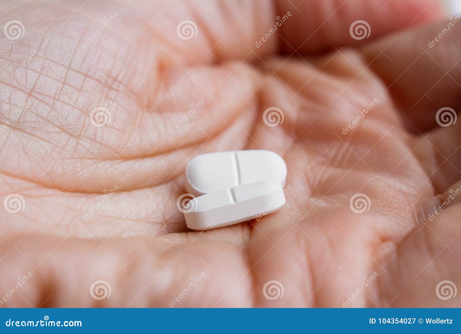 Pain killers in a hand stock image. Image of prescribed - 104354027