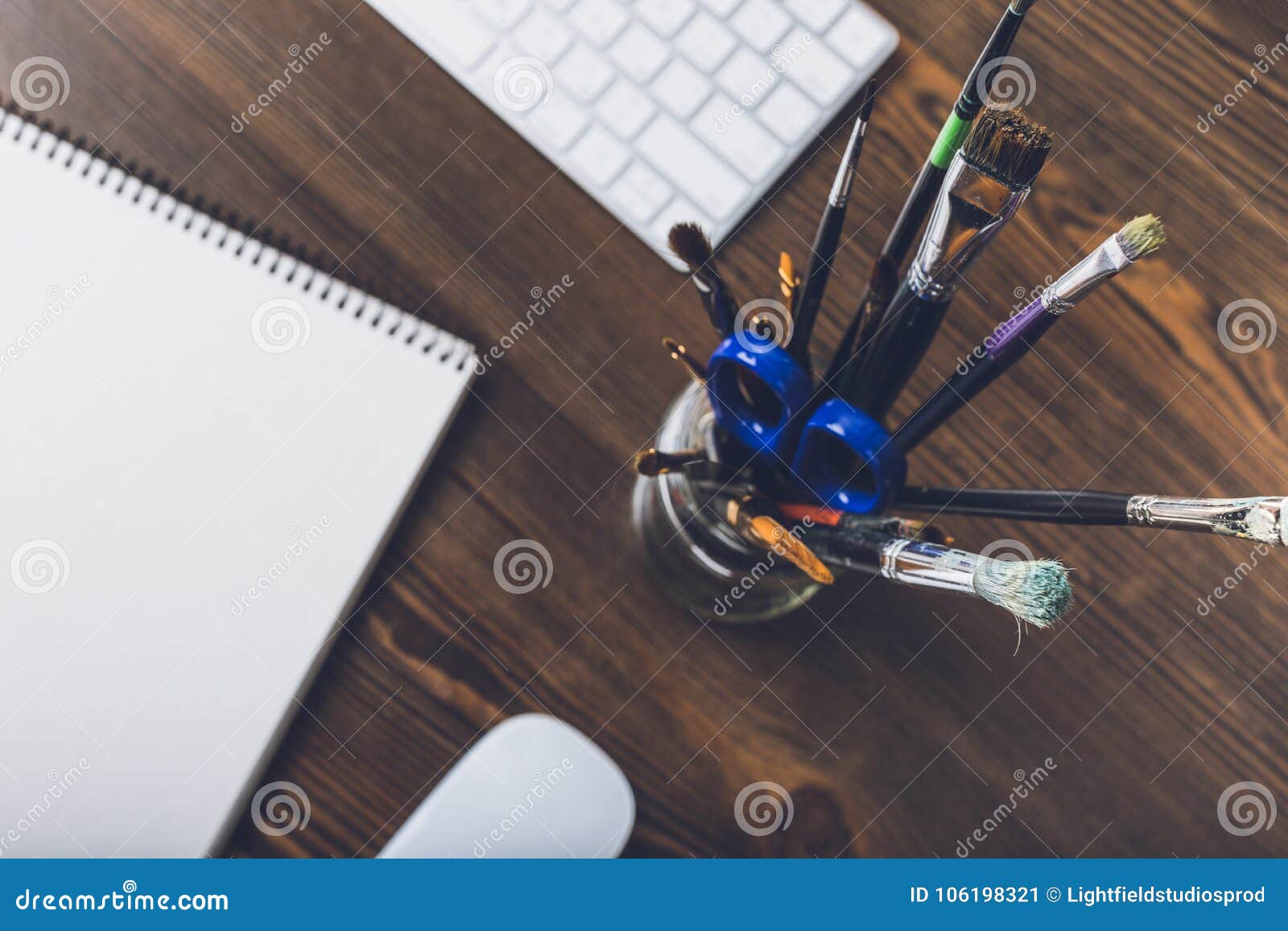 Paint Brushes with Office Supplies, Drawing Album, Computer Mouse and ...