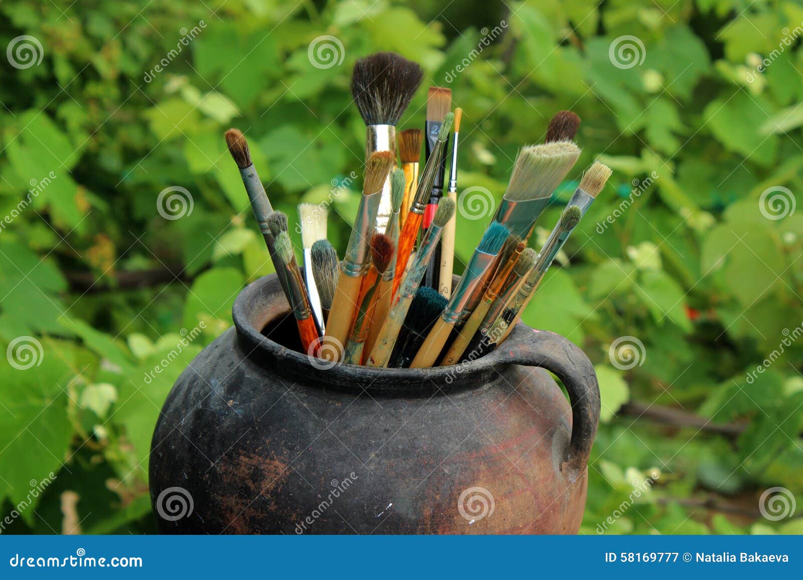 Paint brushes in old pot stock image. Image of paint - 58169777