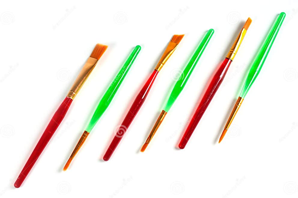 Paint Brushes of Various Shapes and Widths with Bright Plastic Handles ...