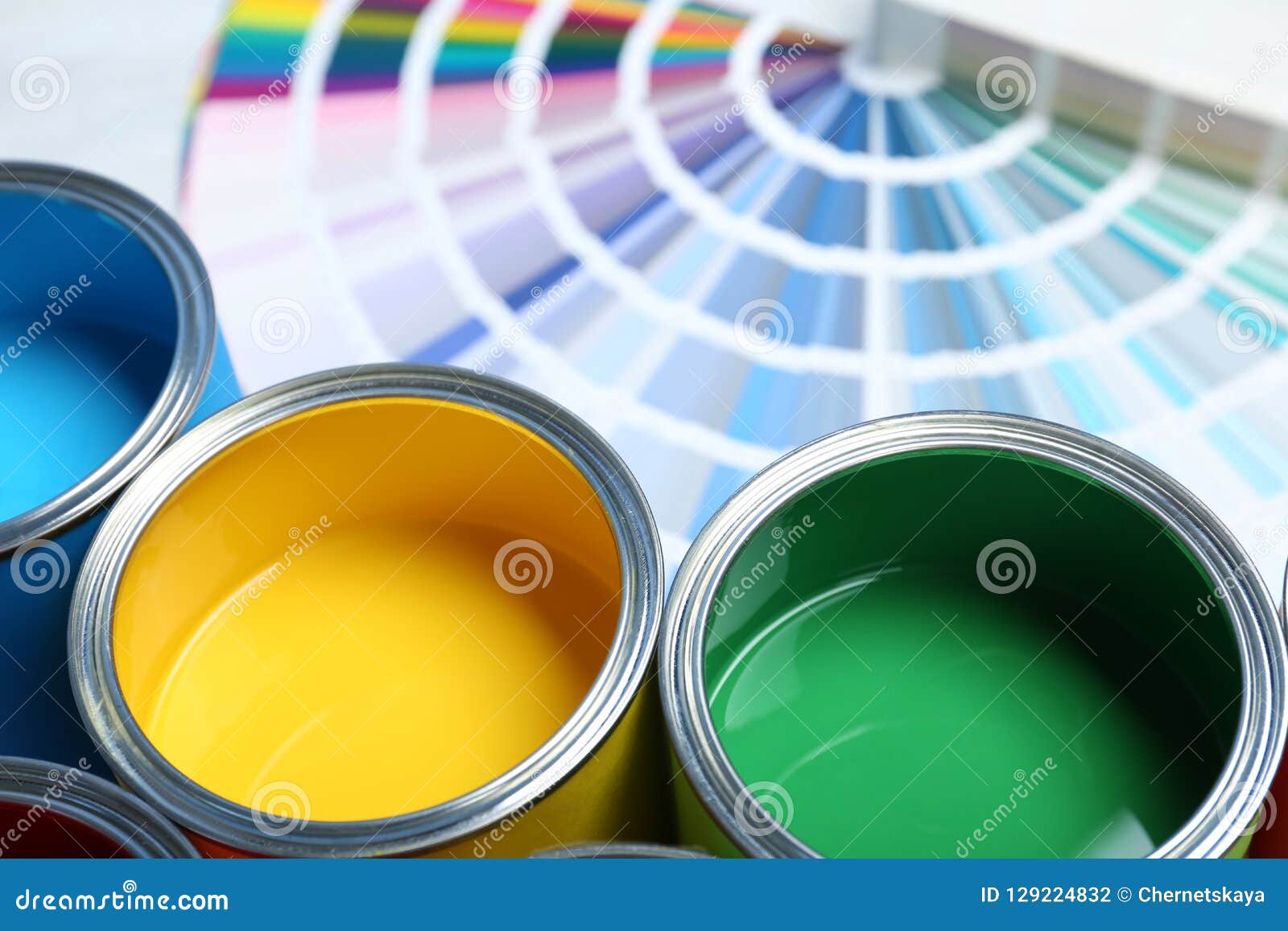 Paint Cans and Color Palette Samples on Table Stock Photo - Image of ...