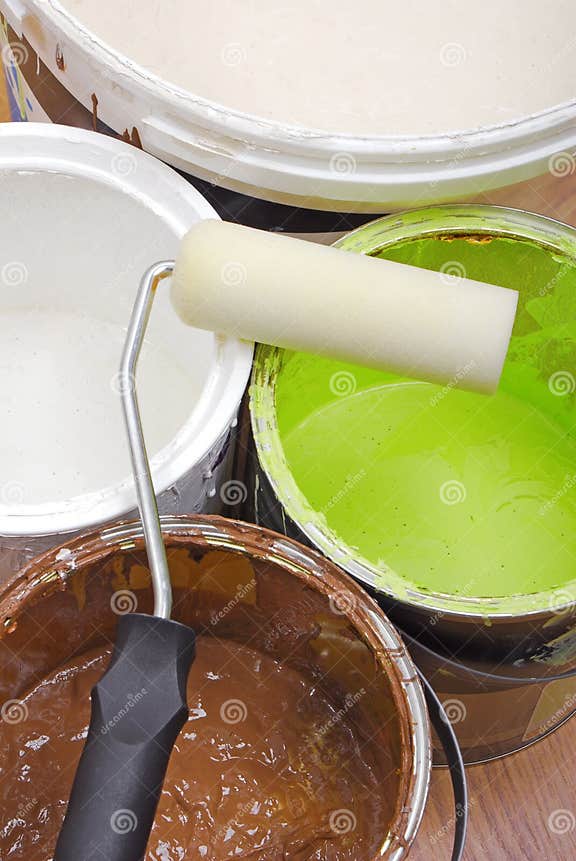 Paint cans and roller stock image. Image of cans, closeup - 43915679