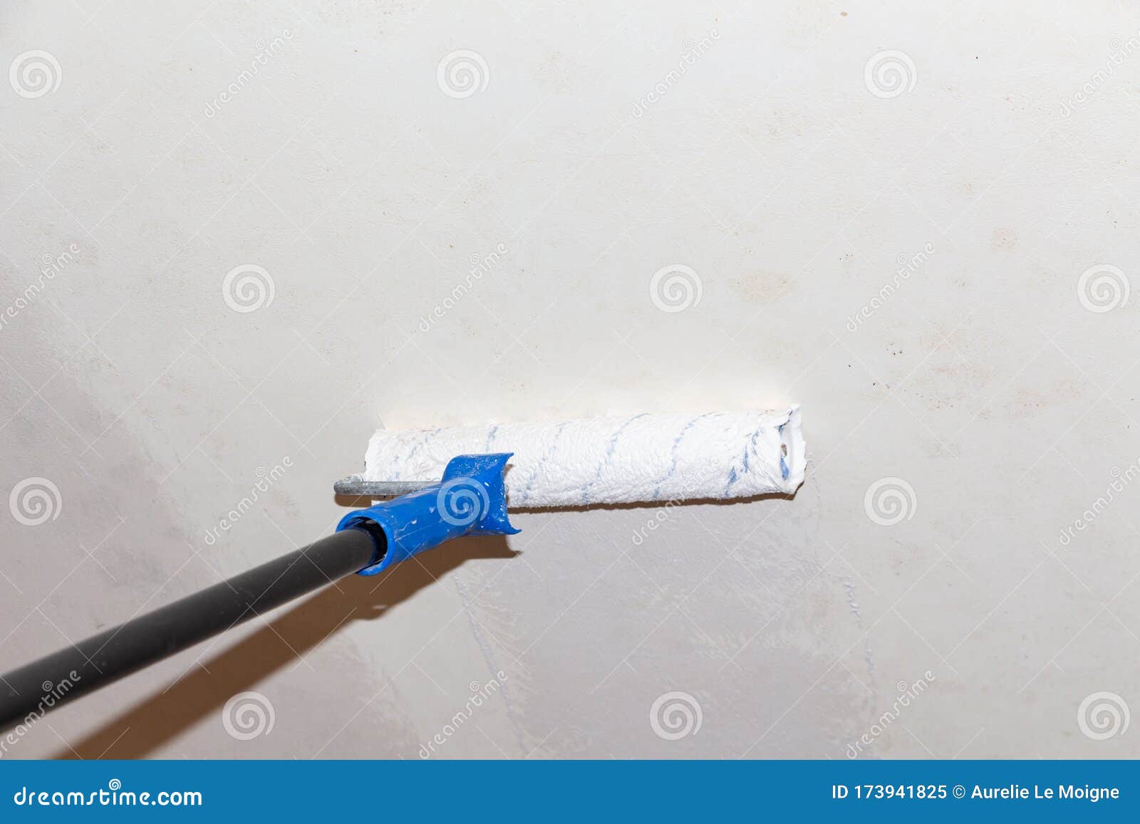 Paint a Ceiling with a Roller Stock Image - Image of renewal ...