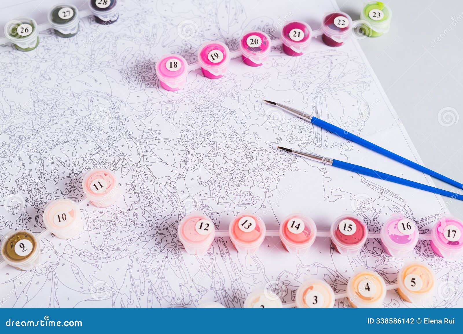 Paint Containers, Brushes and a Paint by Numbers Chart on a Table Stock ...