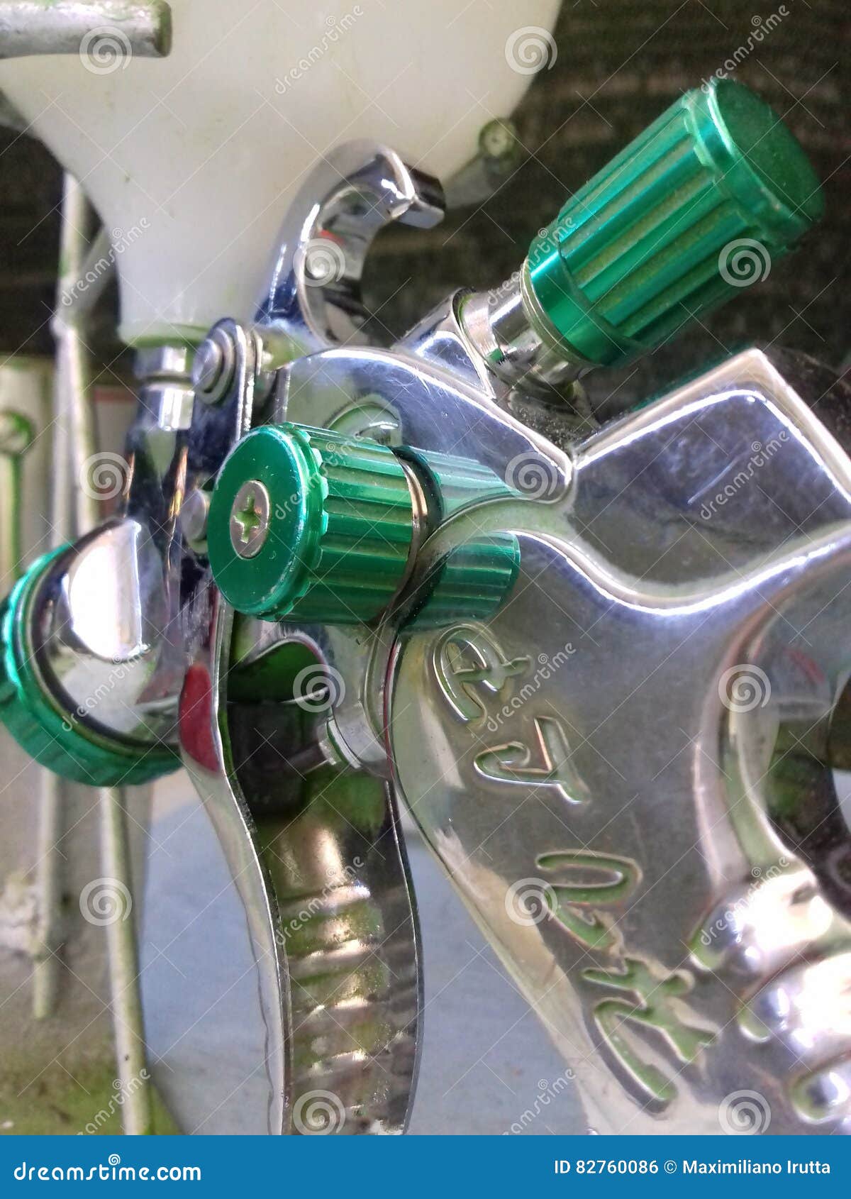 Paint gun art editorial photo. Image of work, paint - 82760086