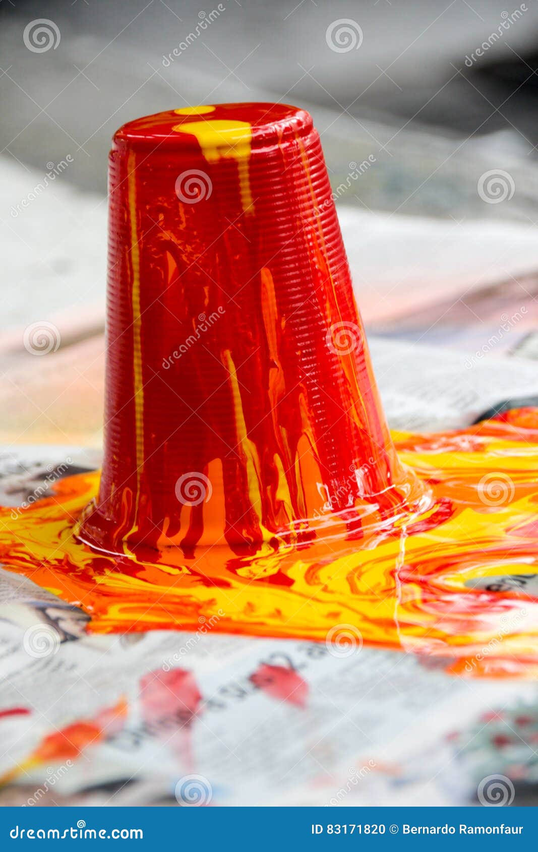 Paint Pouring Out and Spilling on a Paper Stock Photo - Image of liquid ...