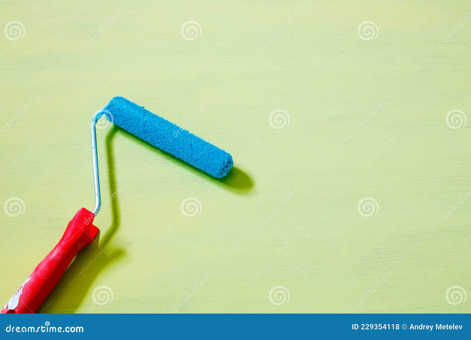 A Paint Roller on a Painted Background Stock Photo - Image of angle ...