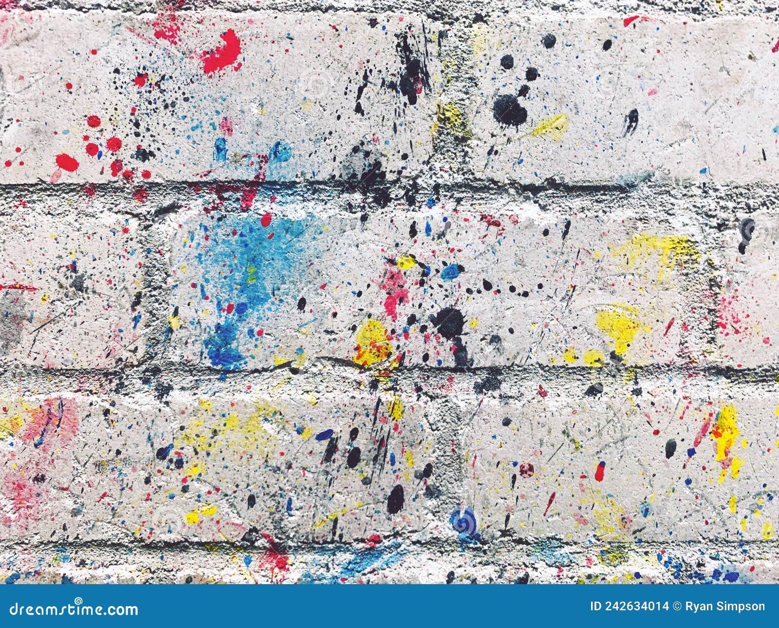 Paint spatter on brick stock photo. Image of spatter - 242634014