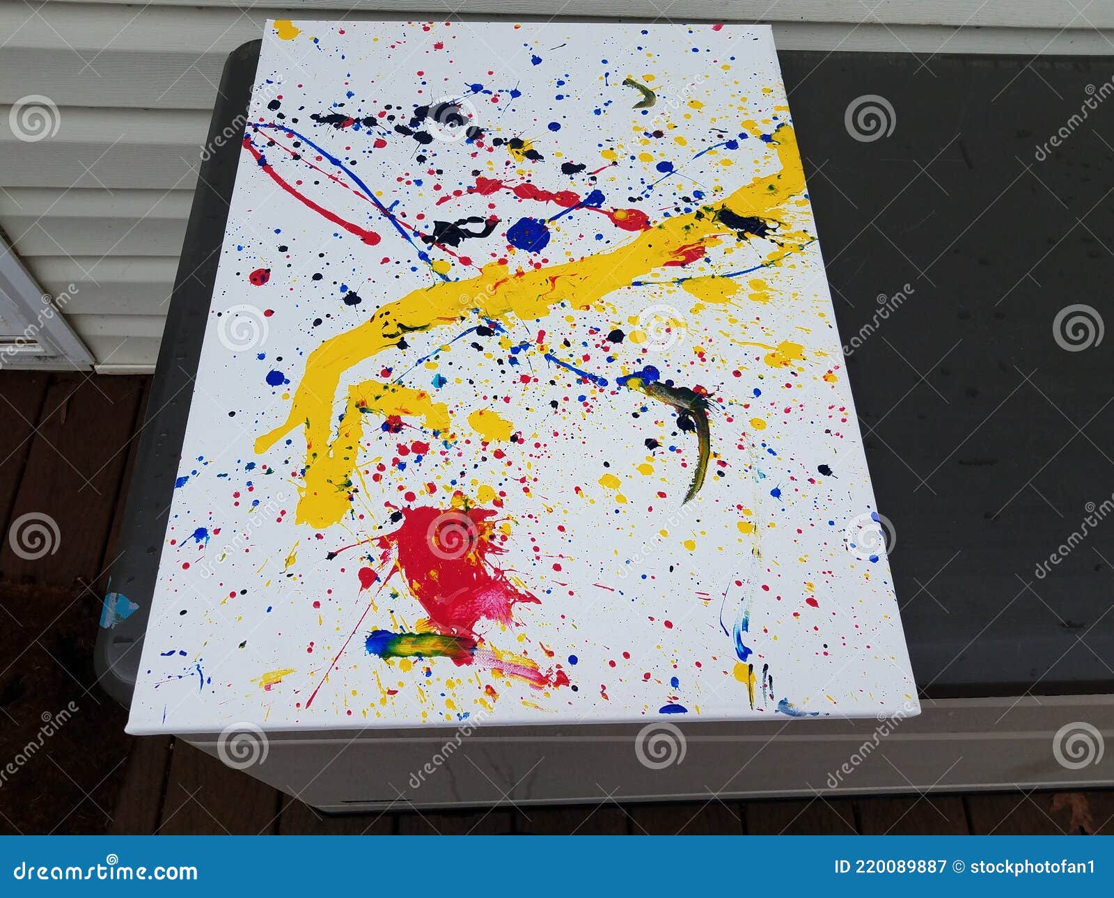 Paint Splatter Mess or Drips on White Canvas on Container Stock Image ...