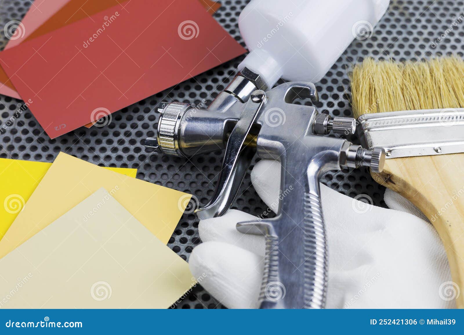 Paint Spray Gun at Work at the Workplace in the Workshop. Stock Photo ...