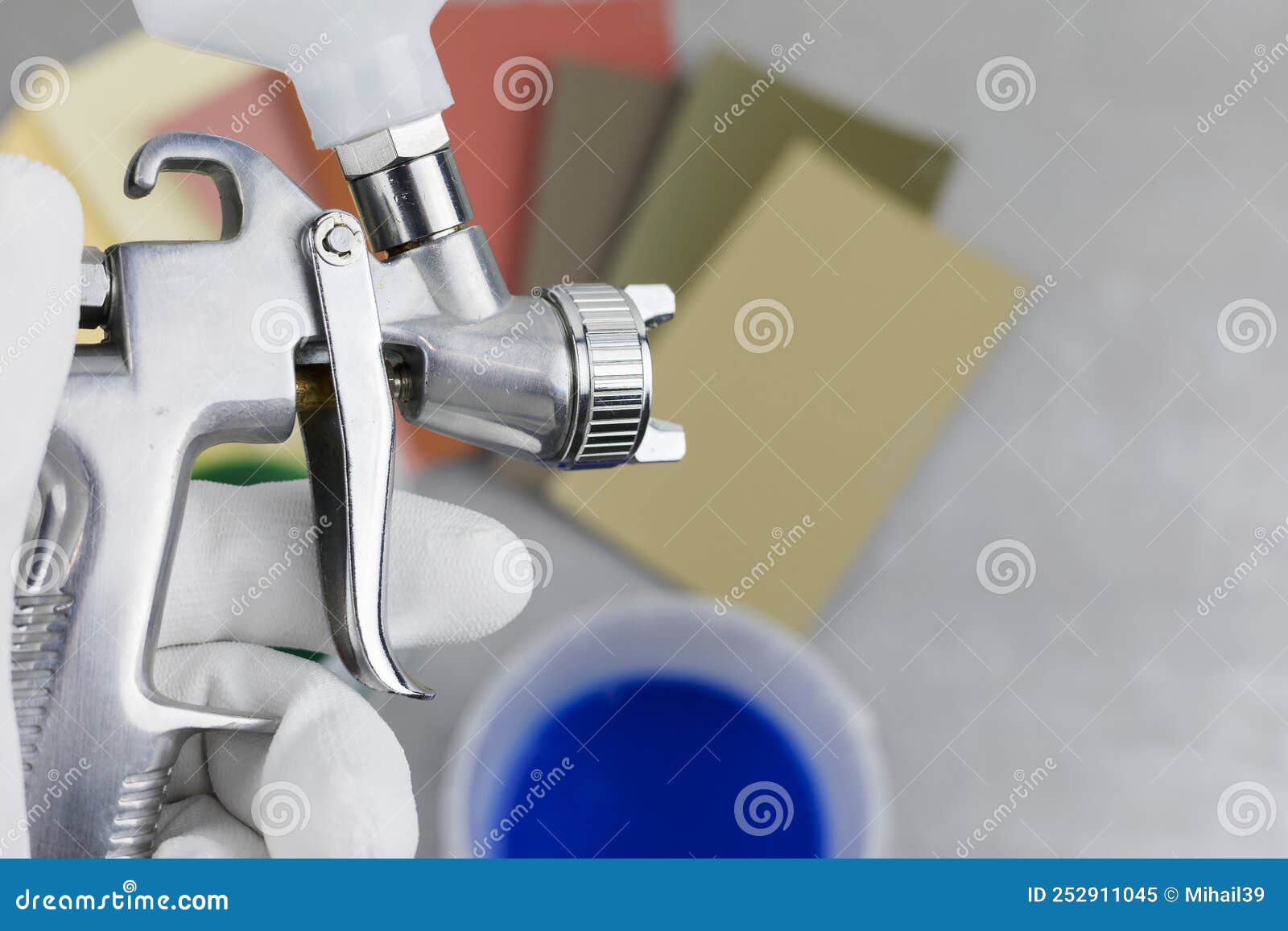 Paint Spray Gun at Work at the Workplace in the Workshop. Stock Image ...