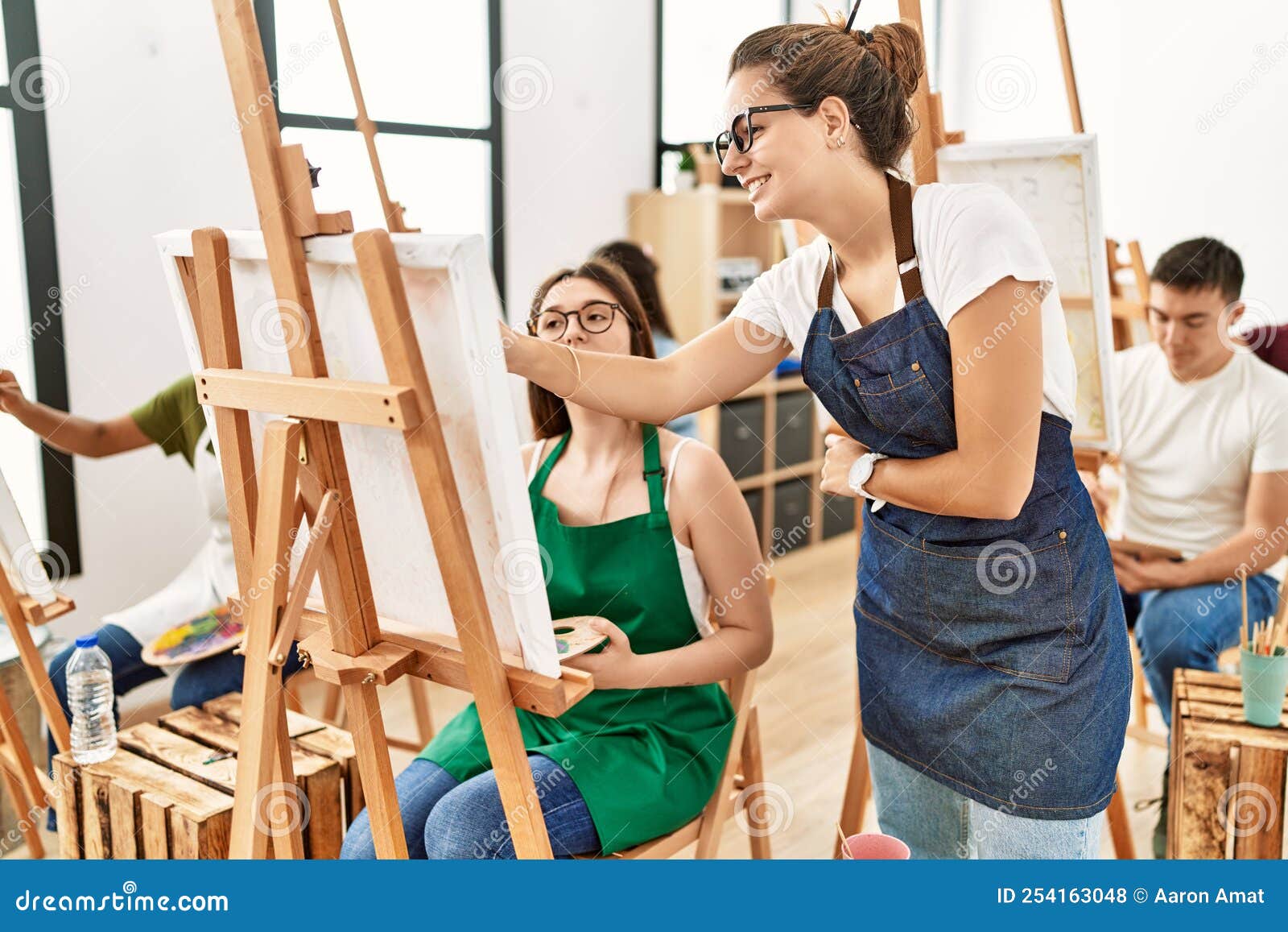 Paint Teacher Looking Draw of Student at Art Studio Stock Photo - Image ...
