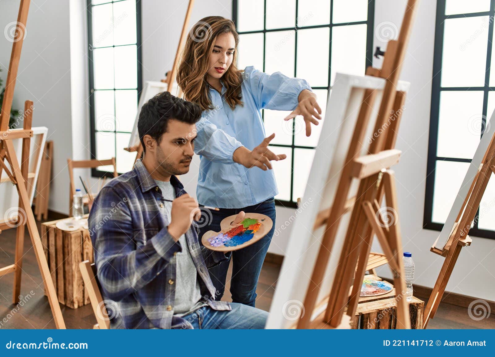Paint Teacher Teaching To Student at Art School Stock Photo - Image of ...