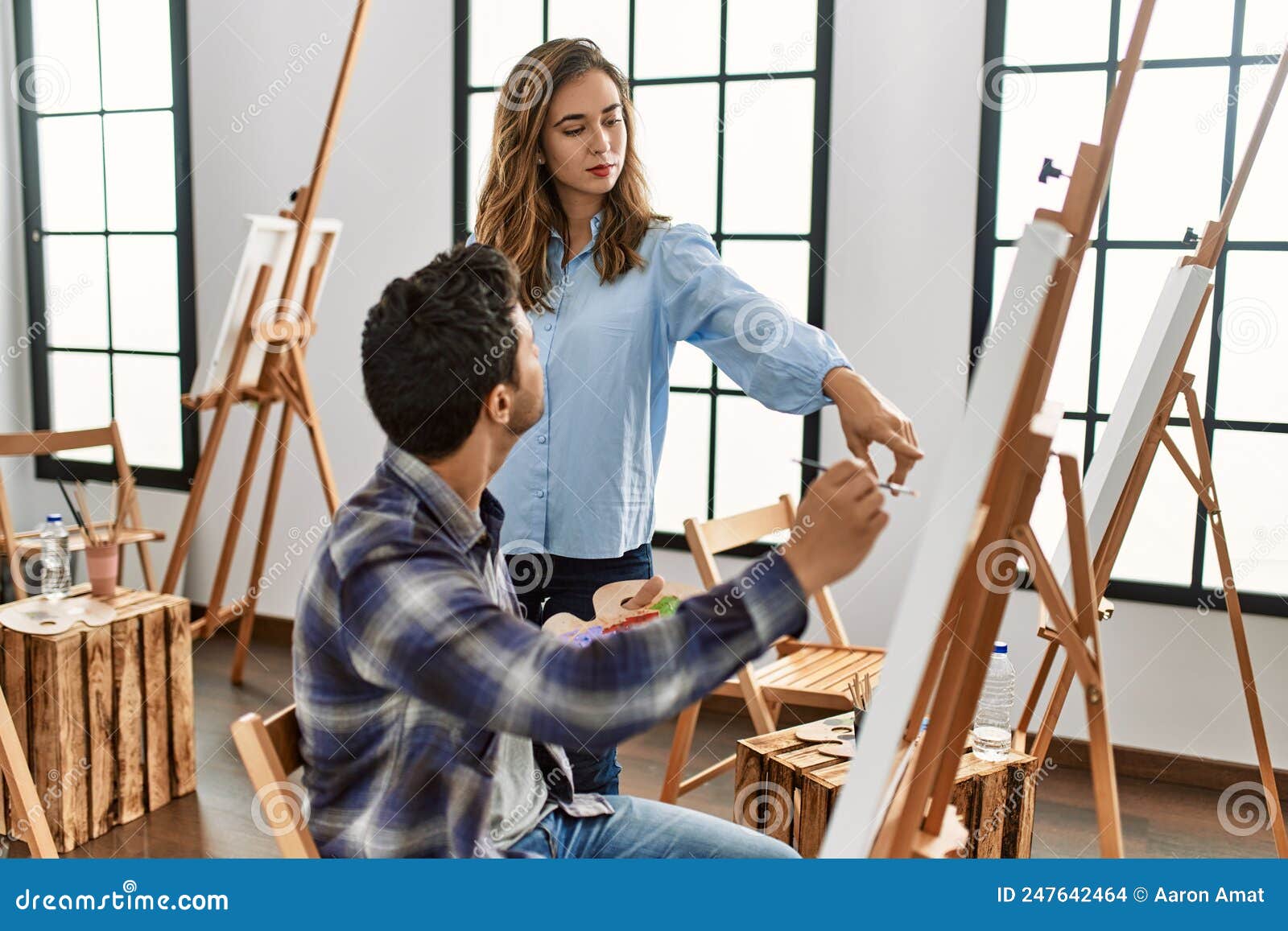 Paint Teacher Teaching To Student at Art School Stock Photo - Image of ...