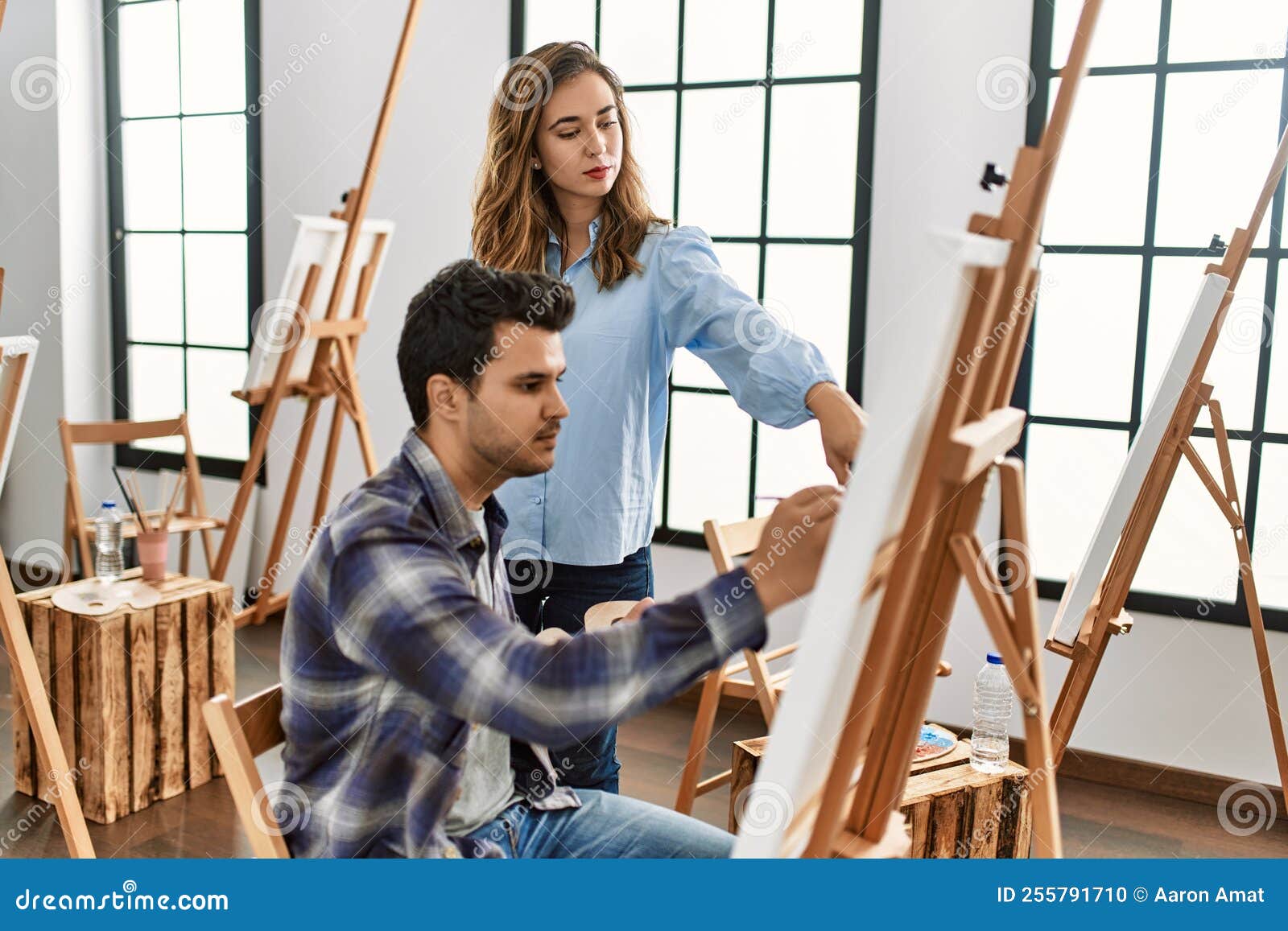Paint Teacher Teaching To Student at Art School Stock Photo - Image of ...