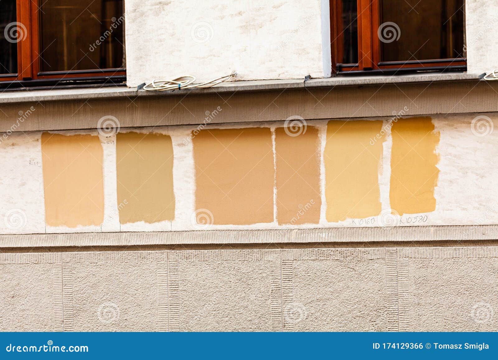 Paint Test Samples on a Building Wall. Trying Various Paint Types ...