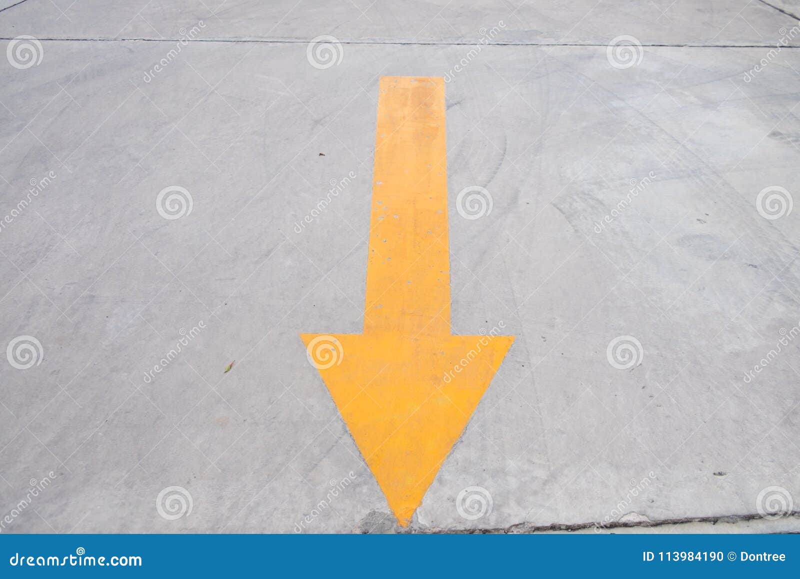 Yellow arrows on ground stock photo. Image of arrow - 113984190