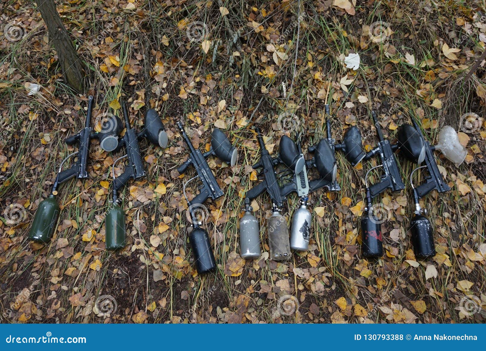 Paintball Guns Lying on Autumn Leaves. Stock Photo - Image of combat ...