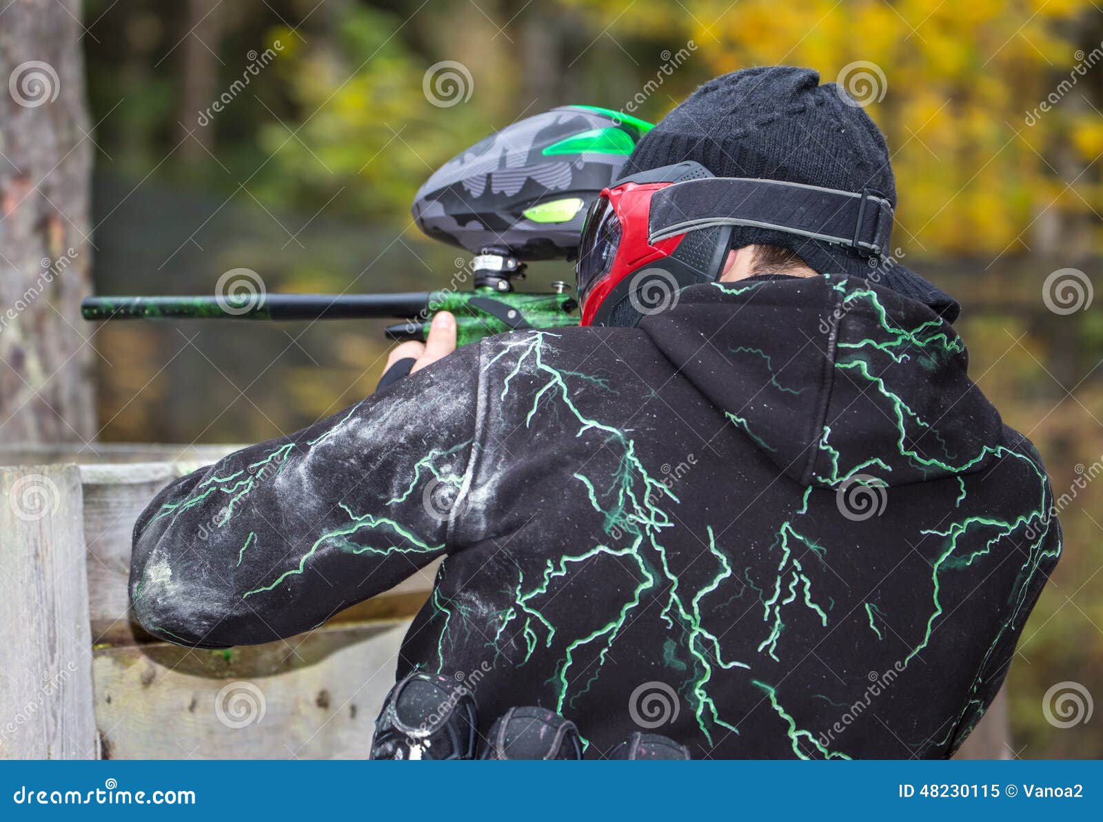 Paintball player aiming stock image. Image of equipment - 48230115