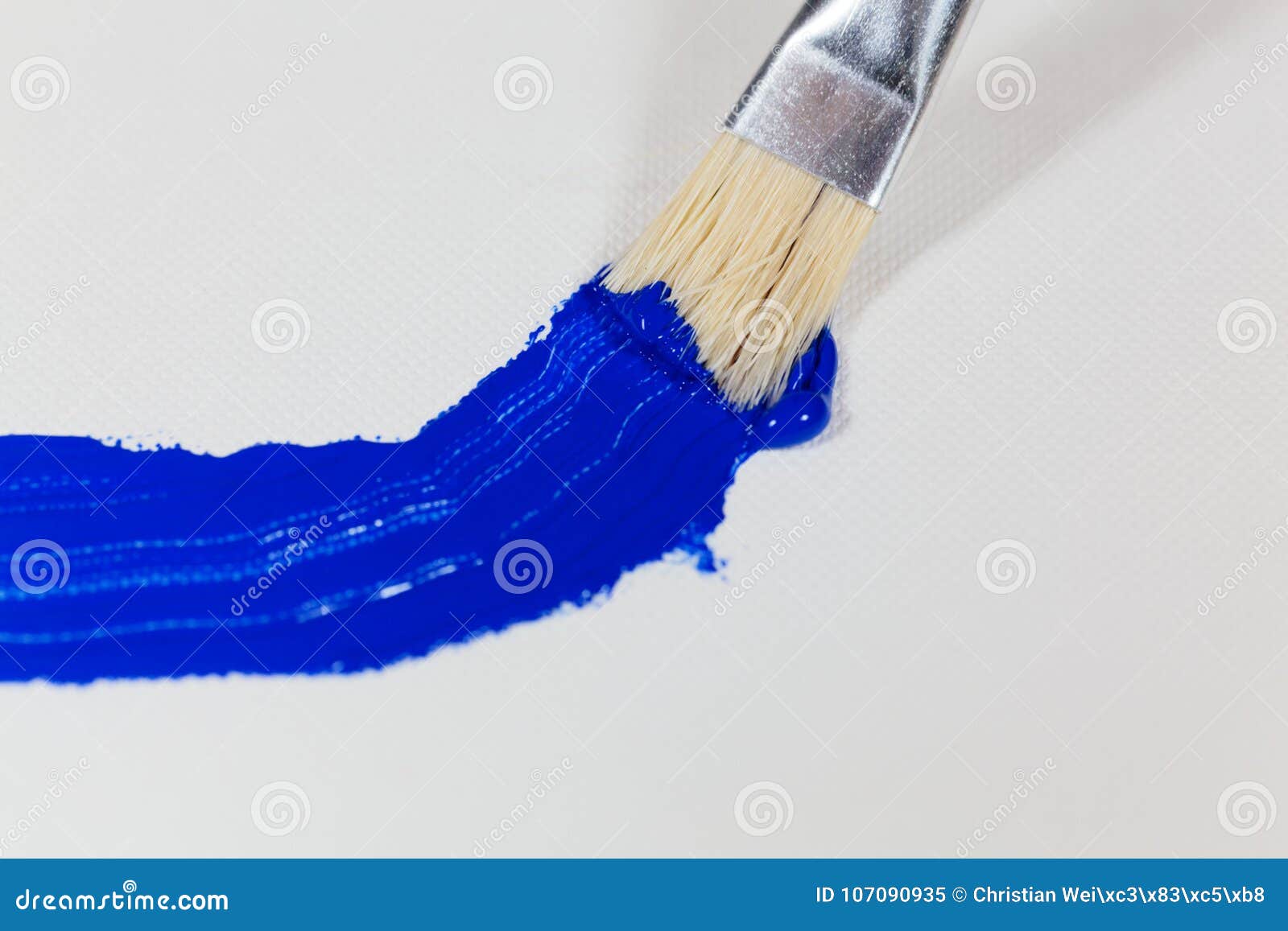 Paintbrush with Blue Color on a Canvas Background Stock Image - Image ...