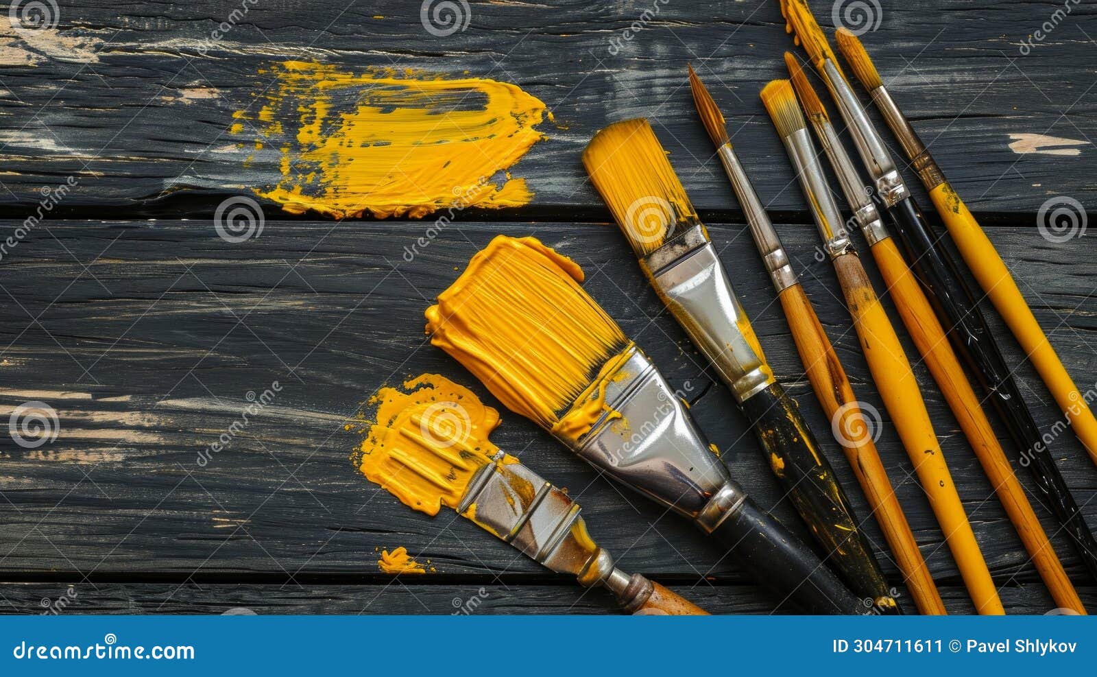 Paintbrush and Yellow Paints on Black Background Stock Image - Image of ...