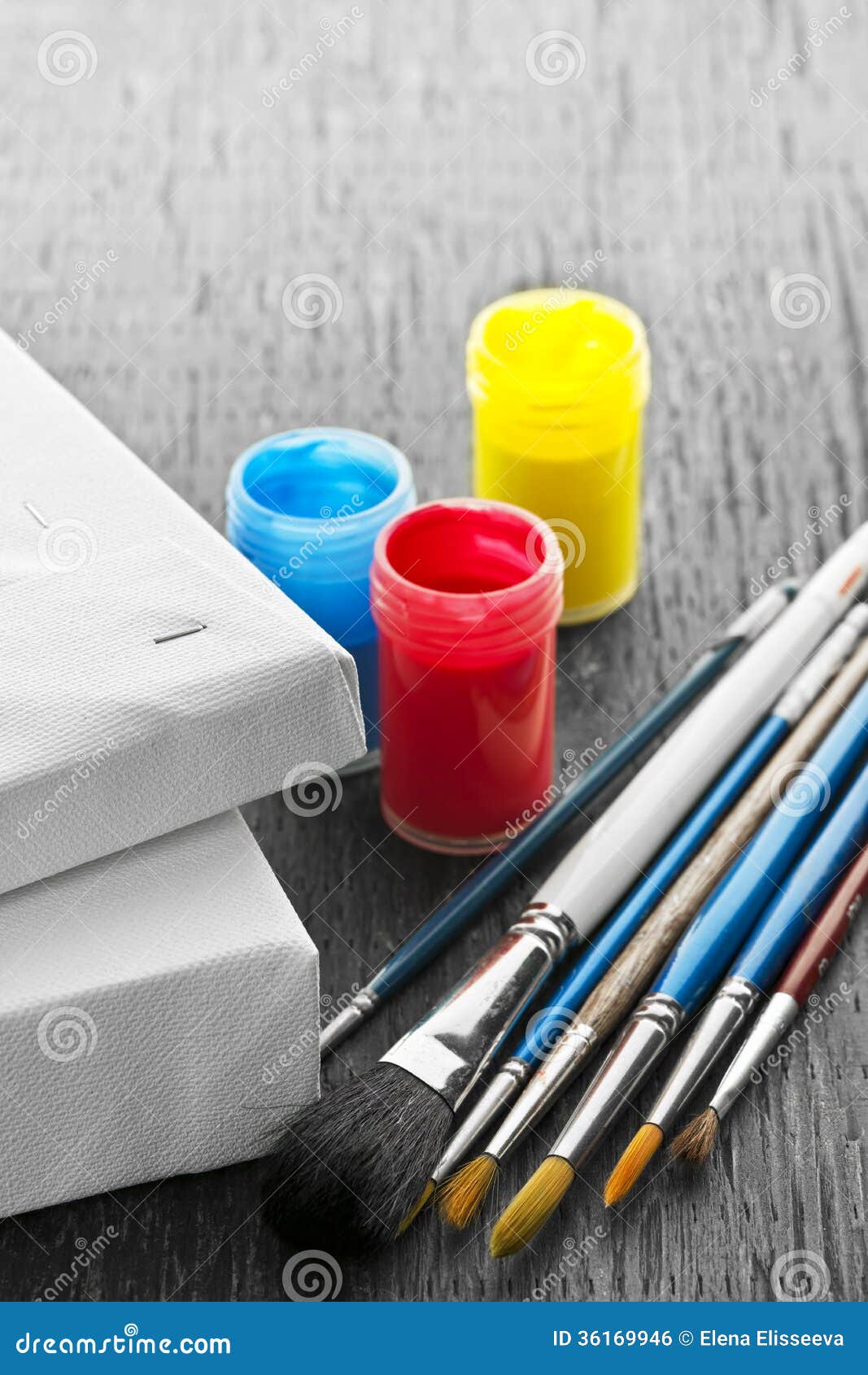 Paintbrushes with canvas stock photo. Image of assorted - 36169946