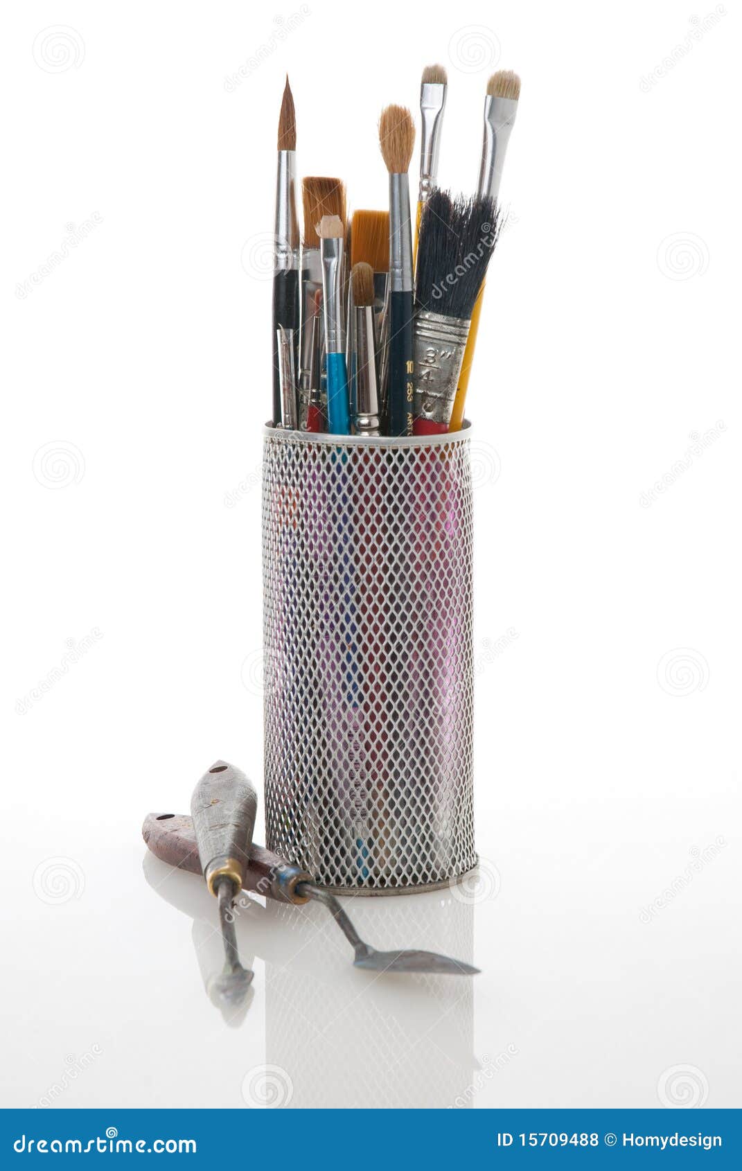 Paintbrushes in a Metal Mesh Holder Stock Photo - Image of painter ...
