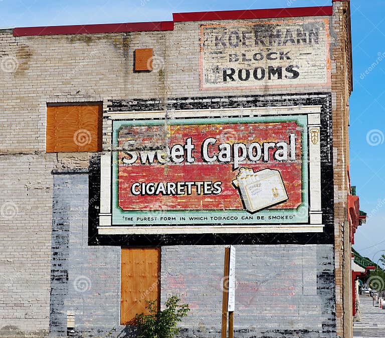 Painted Advertisement on Wall Editorial Photo - Image of retro, mural ...