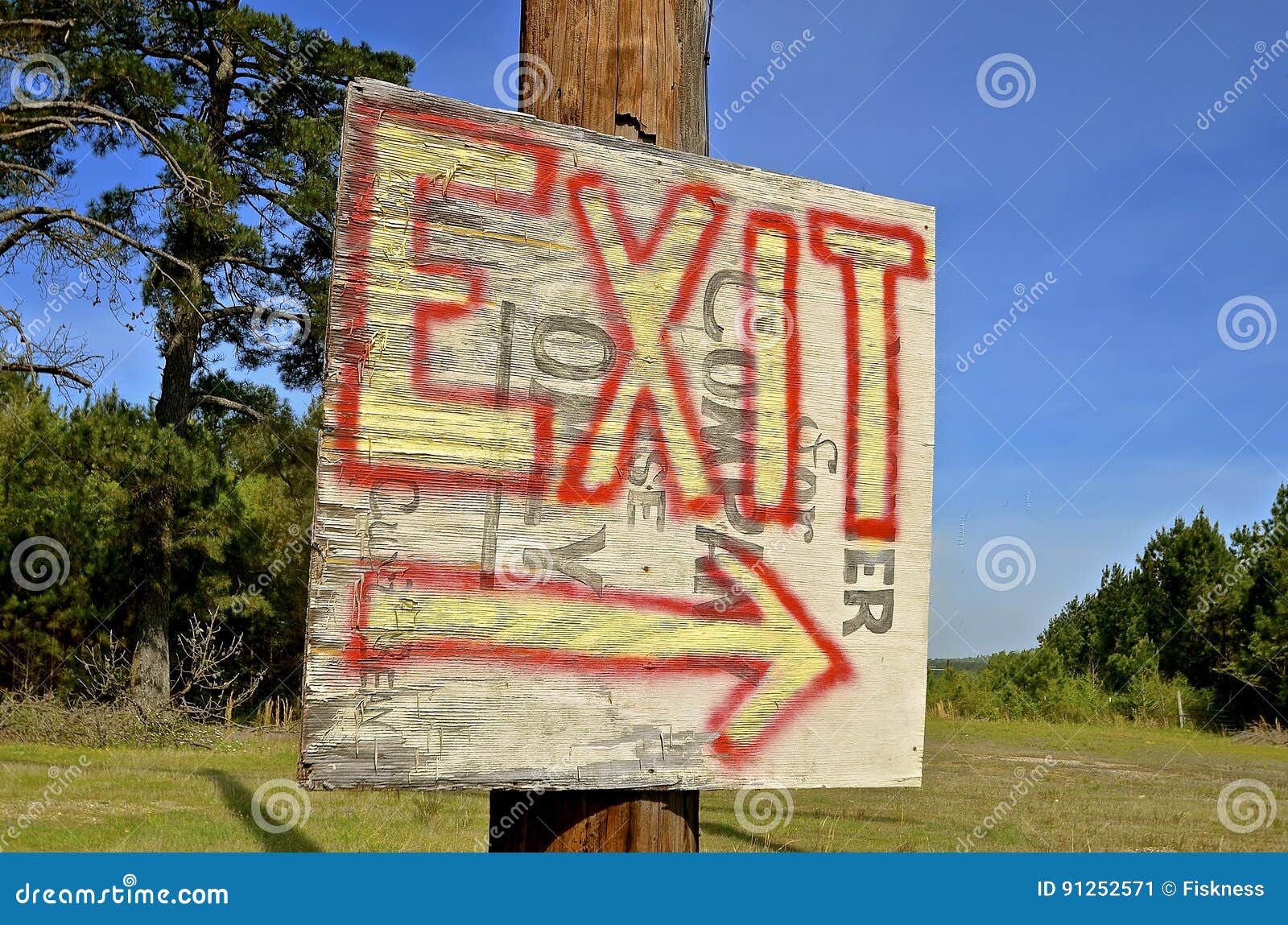 Painted EXIT sign stock image. Image of arrow, yellow - 91252571