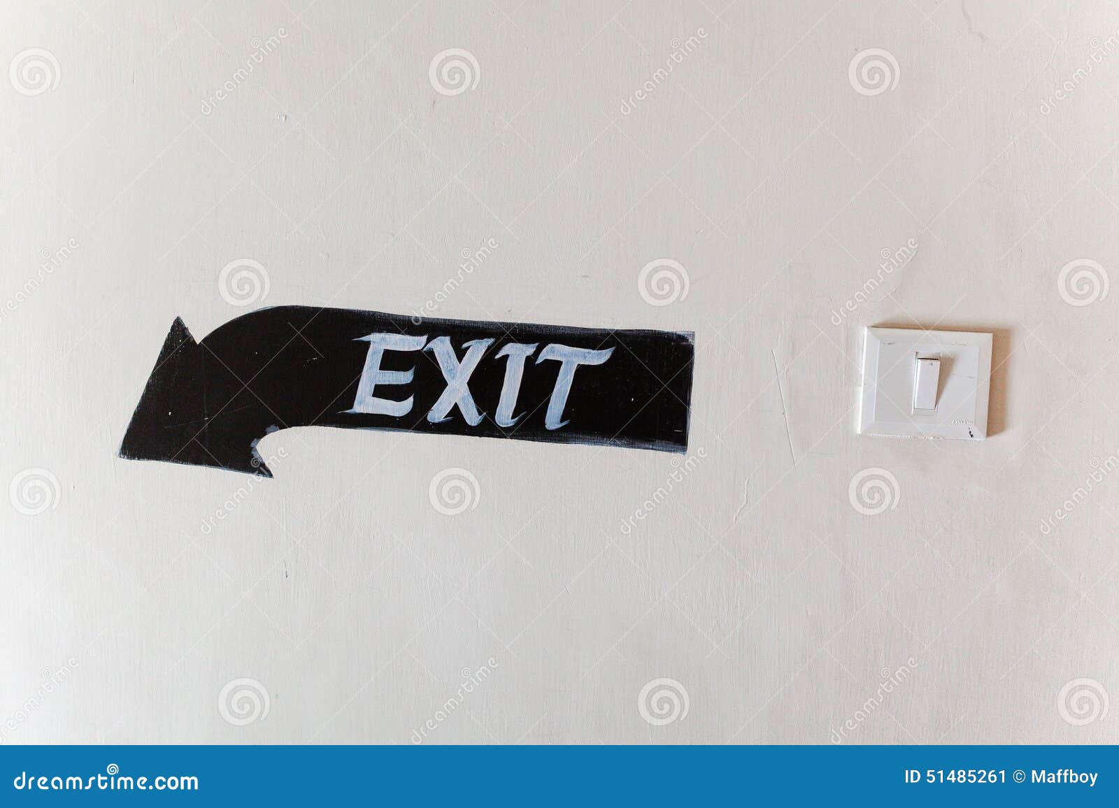 Painted exit sign on wall stock image. Image of directional - 51485261